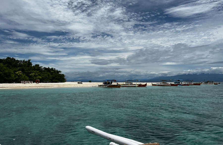 Mantigue Island In Camiguin | Snorkeling Blue Waters • The Gees Travel